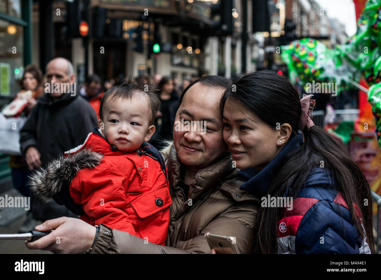London, UK. 18th Feb, 2018. A chinese family seen enjoying their time ...