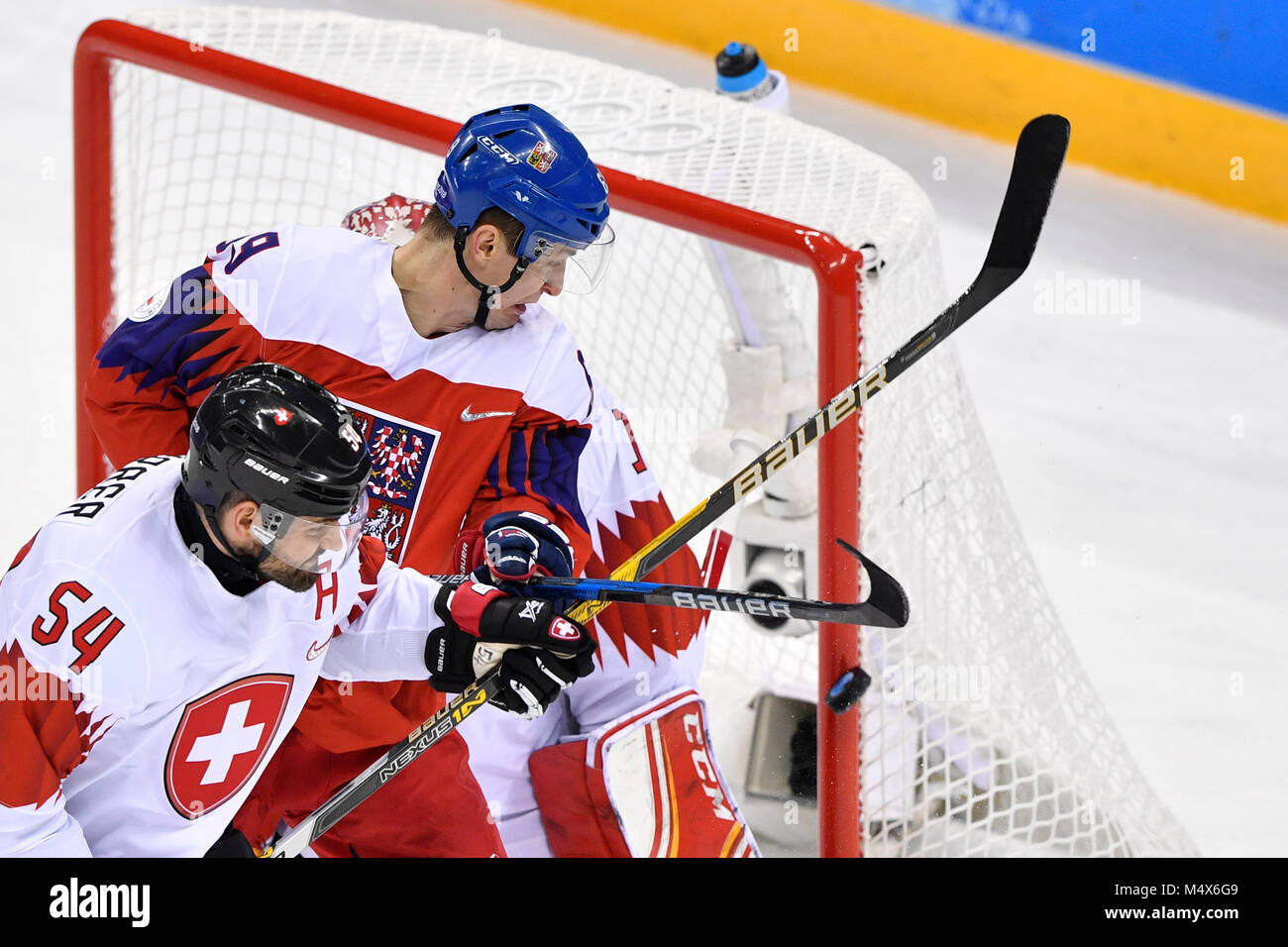 Kangnung, Korea. 18th Feb, 2018. L-R Philippe Furrer (SUI) and Lukas ...