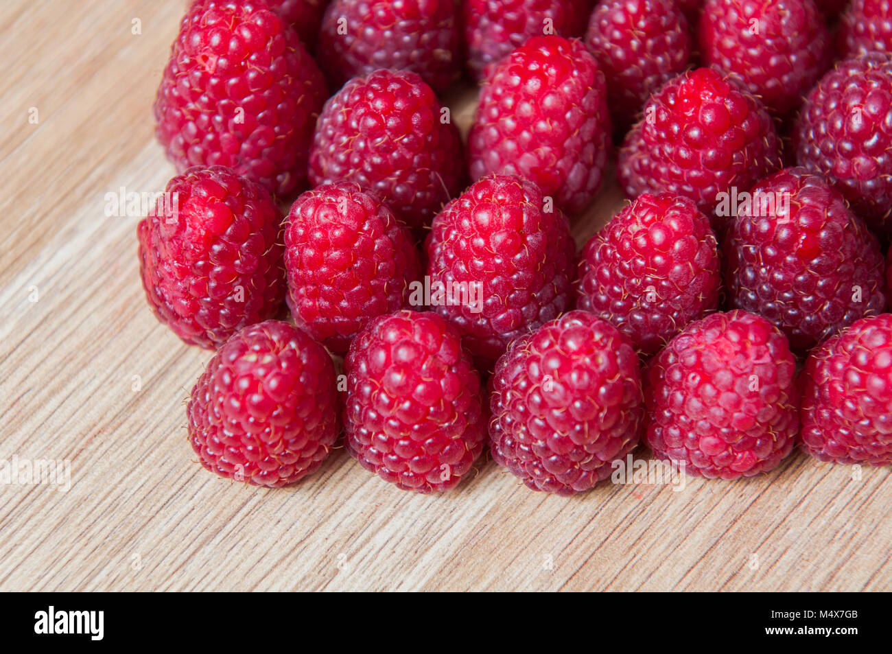 fresh raspberries background Stock Photo - Alamy