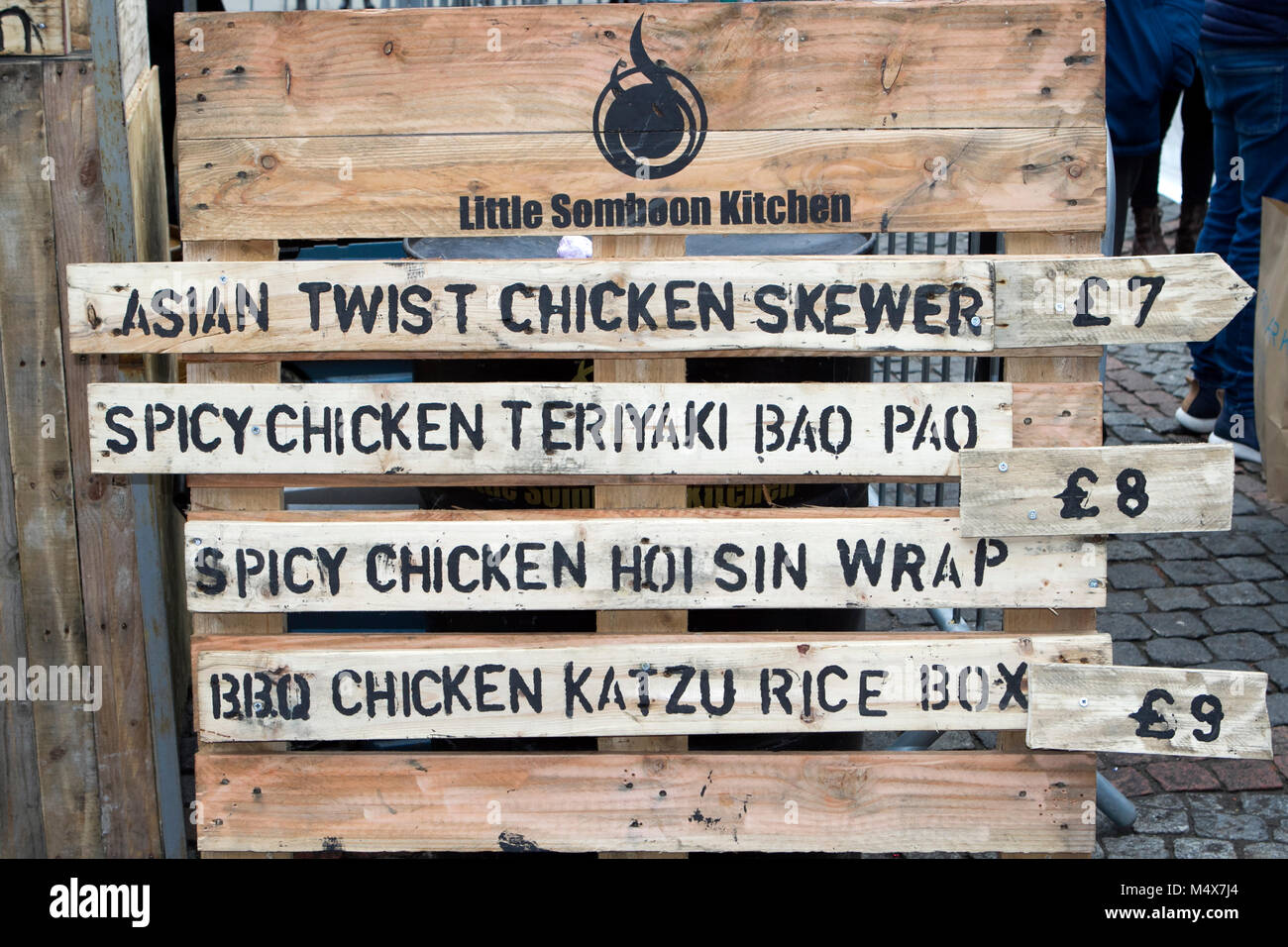 Advertising food on the side of a chicken fast food stall Stock Photo ...