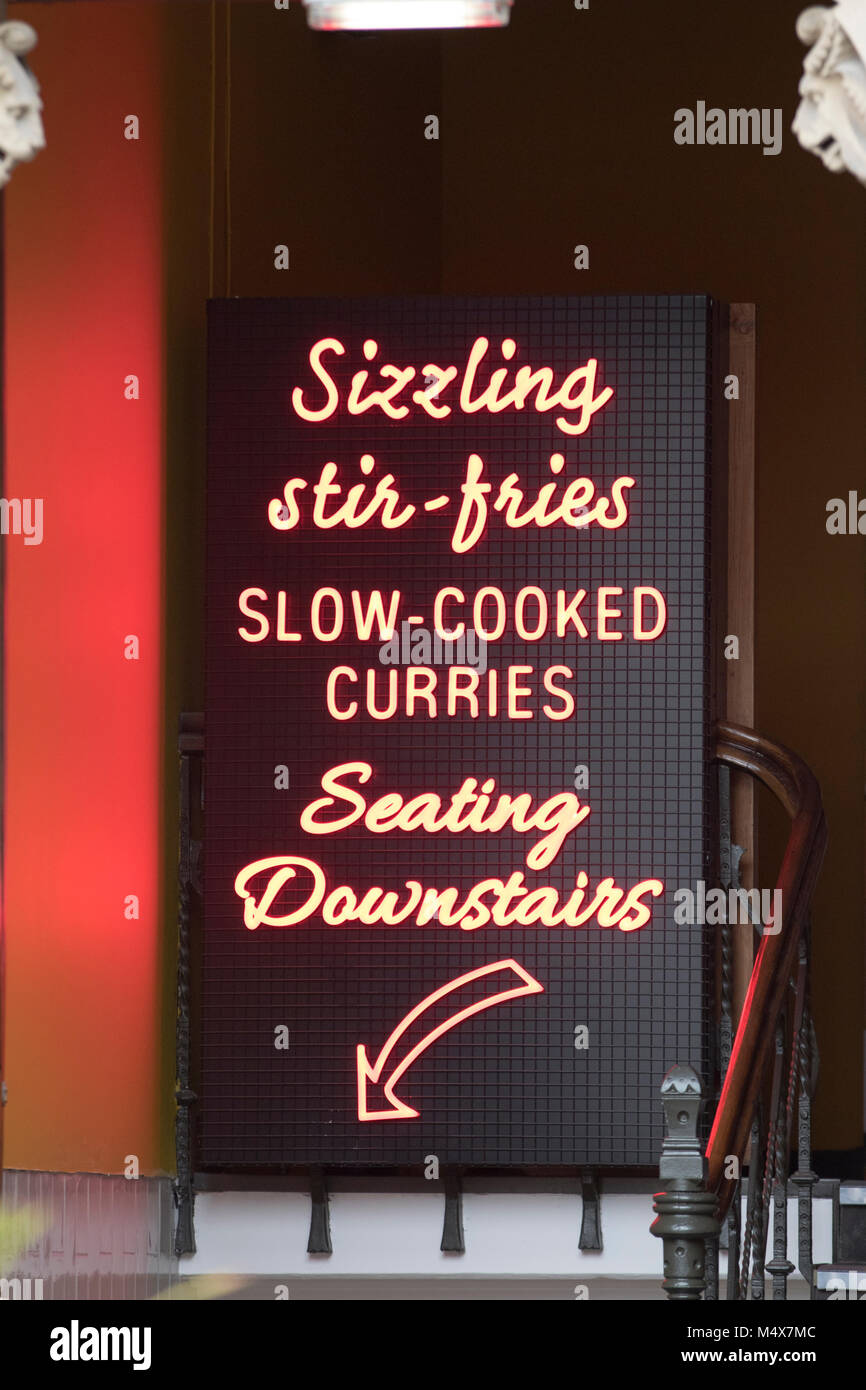 Neon sign for Sizzling stir fry curry house restaurant in Manchester ...
