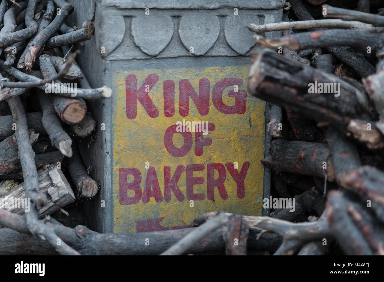 A sign reads King Of Bakery, at the burning ghat, Varanasi, India Stock ...