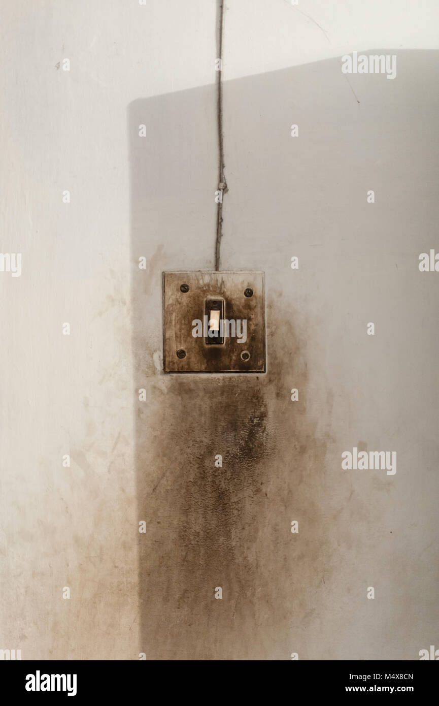 A dirty wall around a light switch, Varanasi, India Stock Photo - Alamy