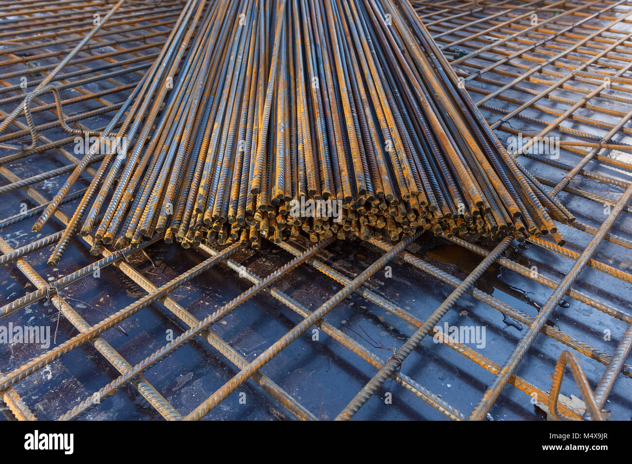 Construction workers fabricating steel reinforcement bar at the ...