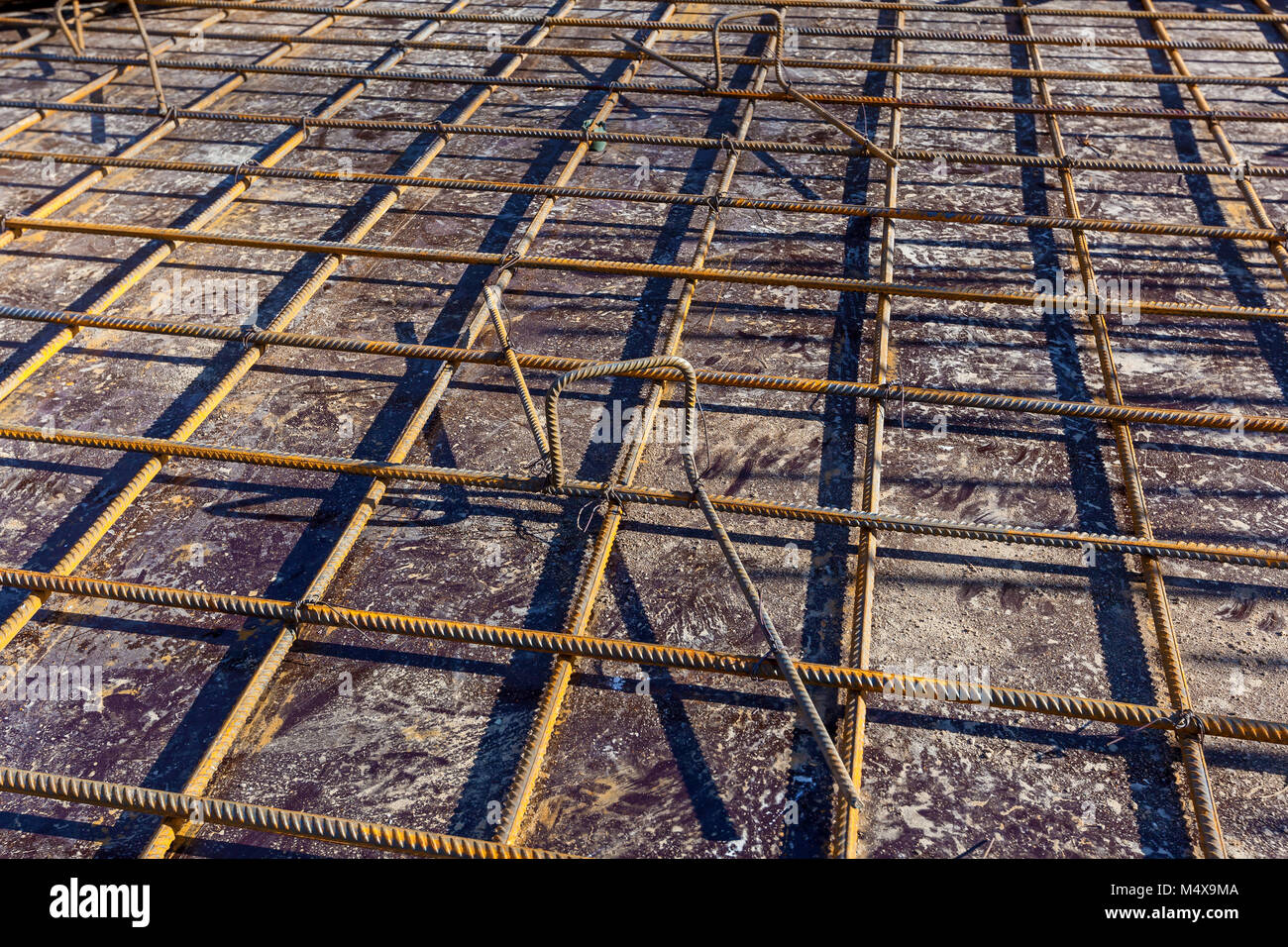 Construction workers fabricating steel reinforcement bar at the ...