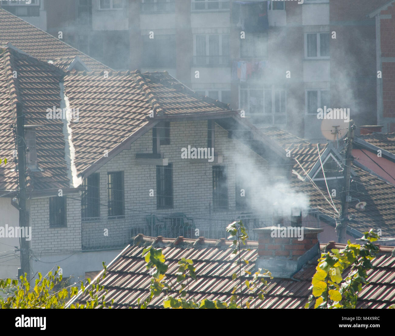 Pollution from burning wood in Kosovo Stock Photo - Alamy