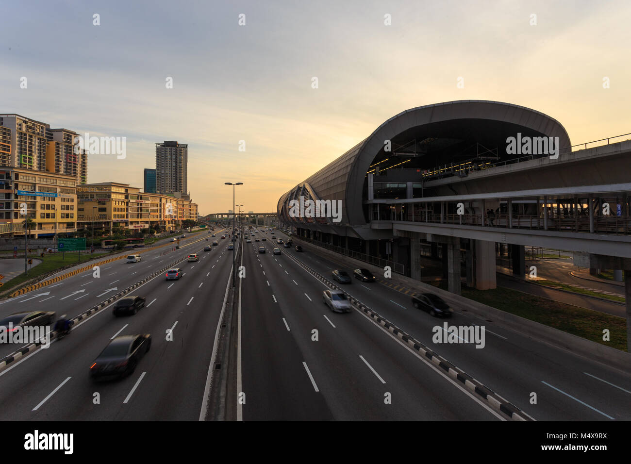 Light trails scene at LRT Puchong city during sunset Stock Photo - Alamy