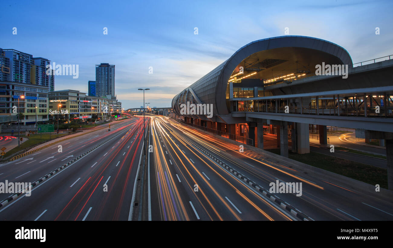 Light trails scene at LRT Puchong city during sunset Stock Photo - Alamy