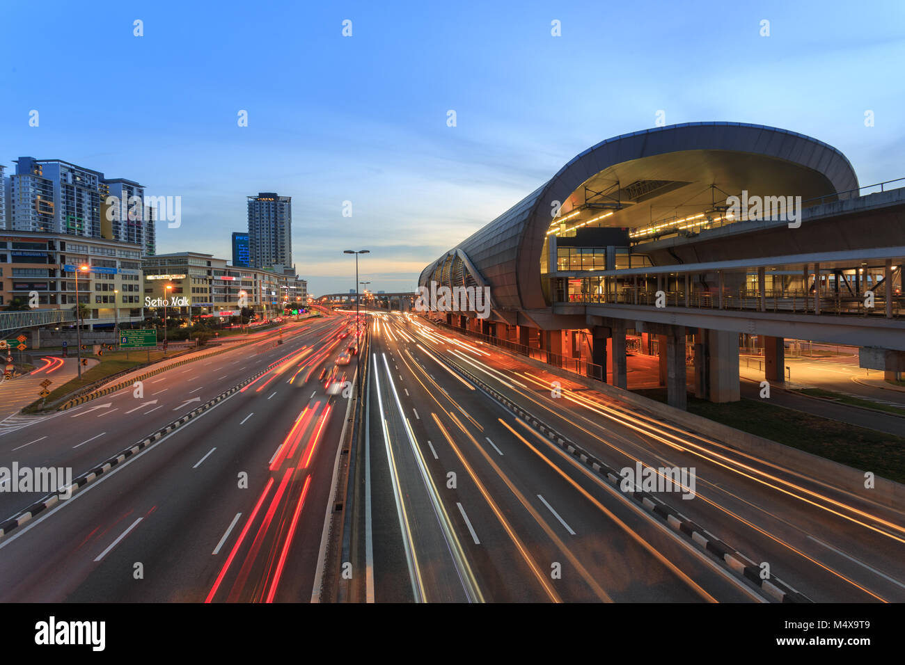 Light trails scene at LRT Puchong city during sunset Stock Photo - Alamy