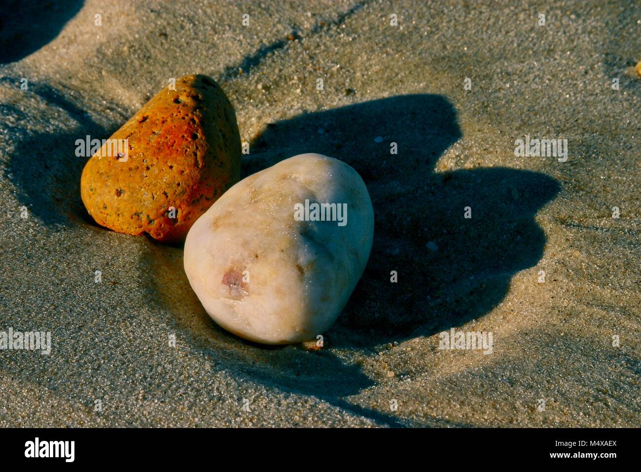 Small Rocks on Beach Stock Photo - Alamy