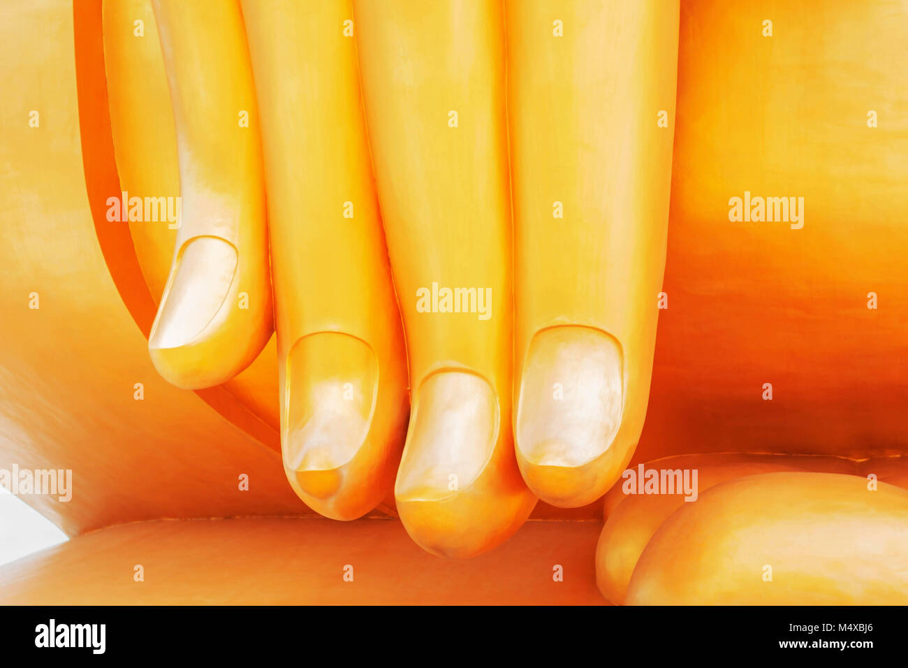 fingers of Buddha with beautiful golden in thailand Stock Photo - Alamy