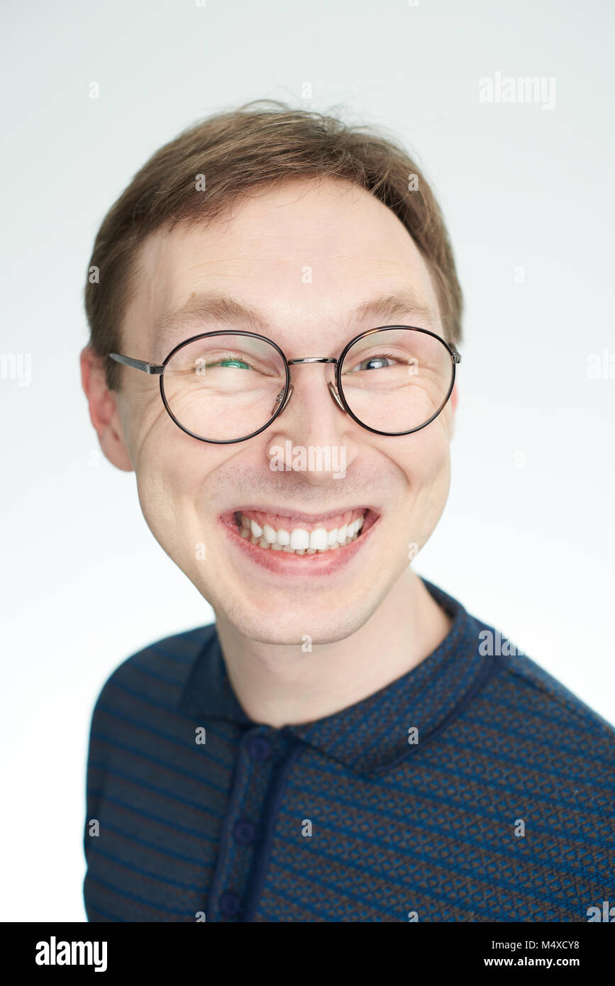 Laughing face of young man isolated on white background Stock Photo - Alamy