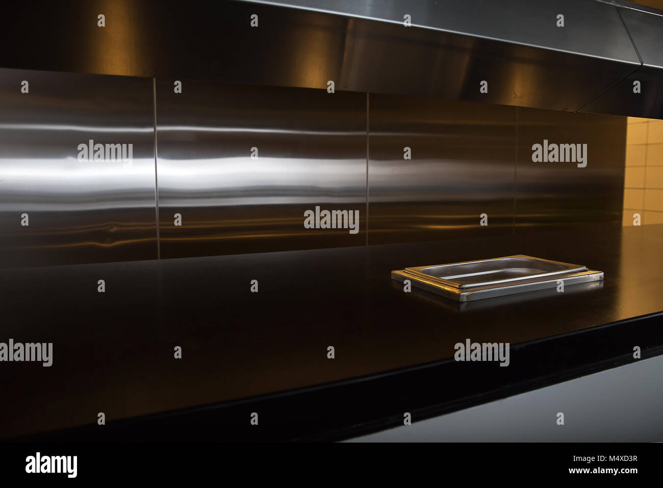 Professional kitchen, view counter in steel Stock Photo - Alamy