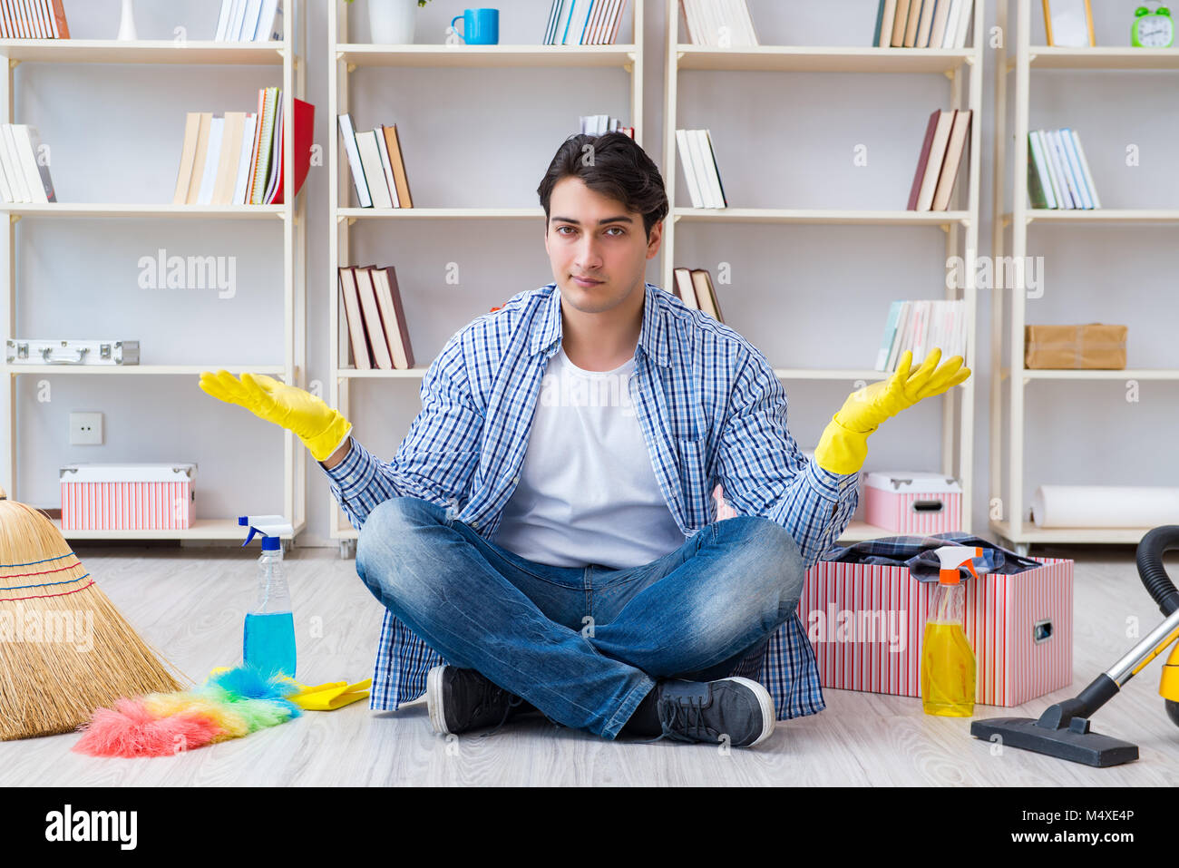 Man doing cleaning at home Stock Photo - Alamy