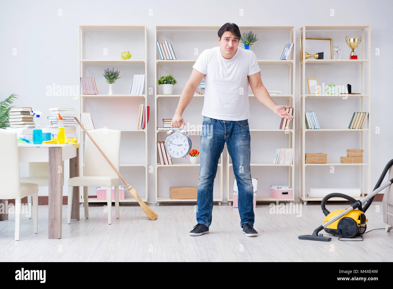 Man doing cleaning at home Stock Photo - Alamy