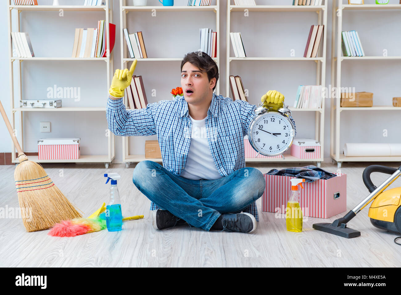 Man doing cleaning at home Stock Photo - Alamy