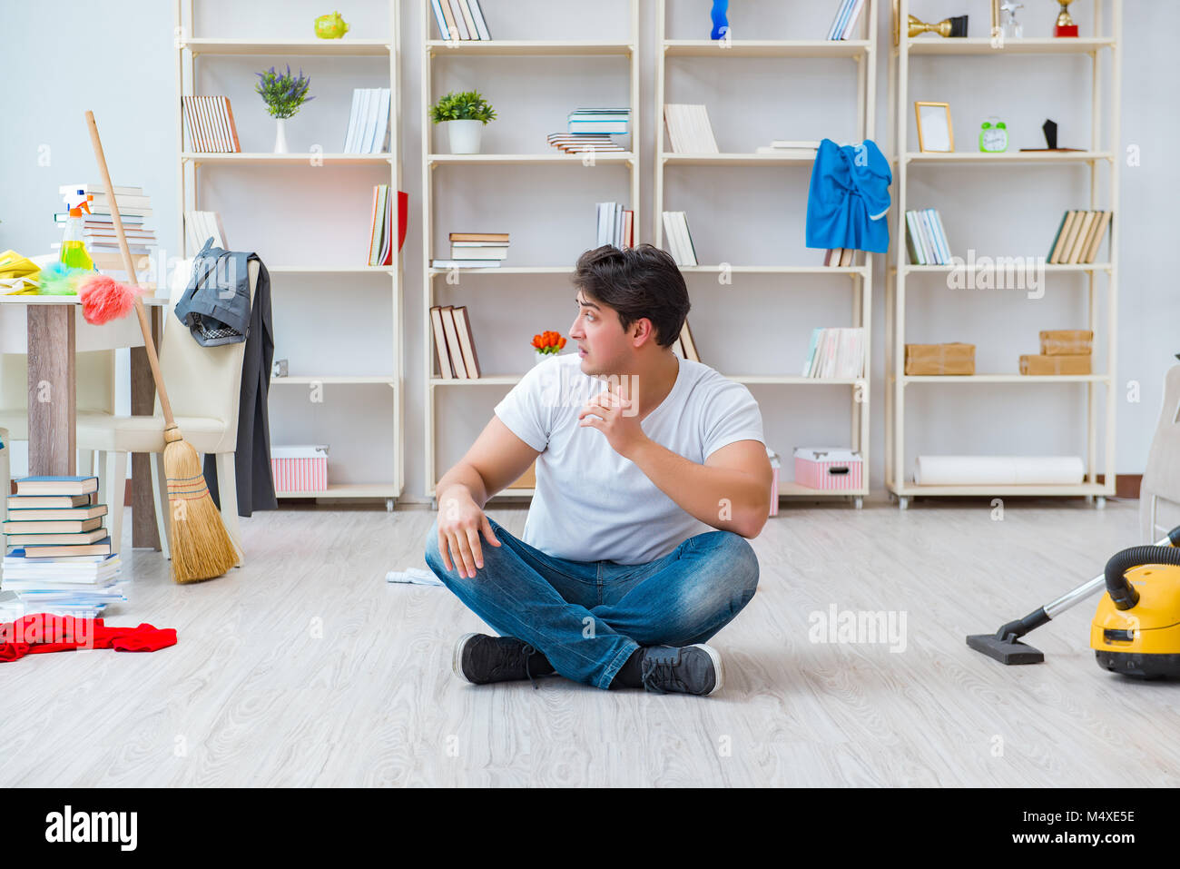 Man doing cleaning at home Stock Photo - Alamy