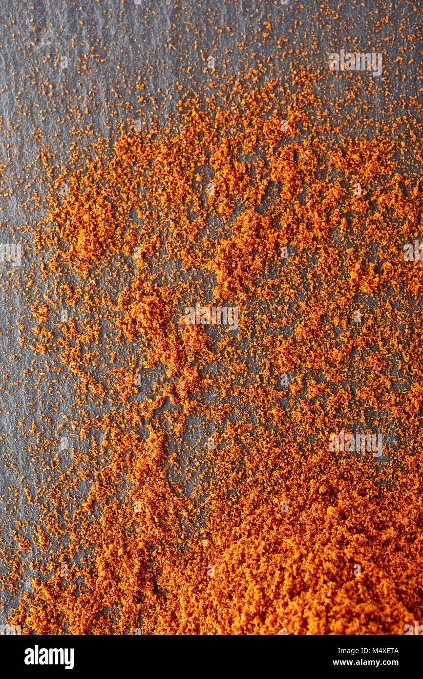 Top view on the texture background of red chilli pepper powder Stock ...