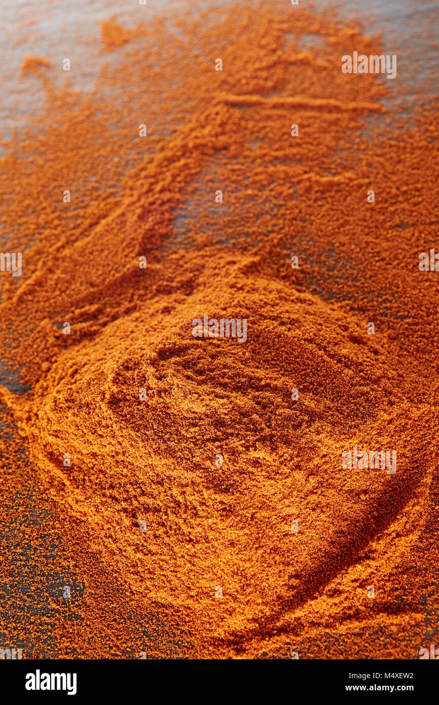 Top view on the texture background of red chilli pepper powder Stock ...