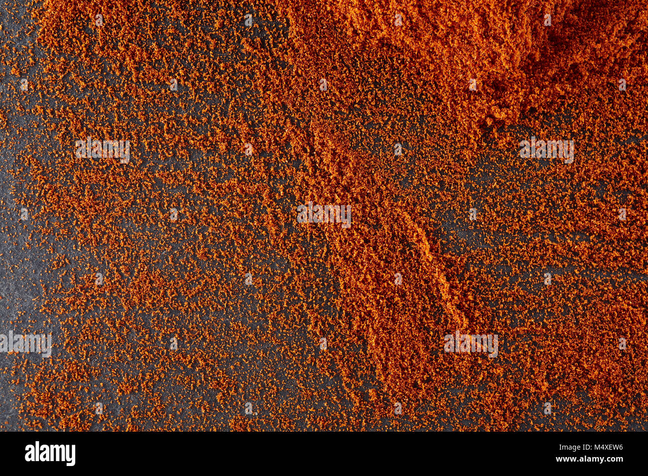 Top view on the texture background of red chilli pepper powder Stock ...
