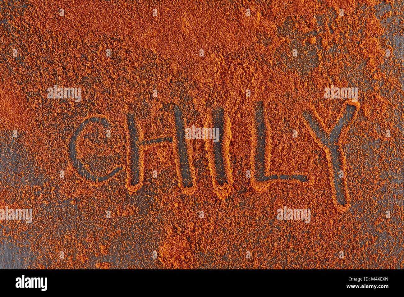 Top view on the texture background of red chilli pepper powder Stock ...
