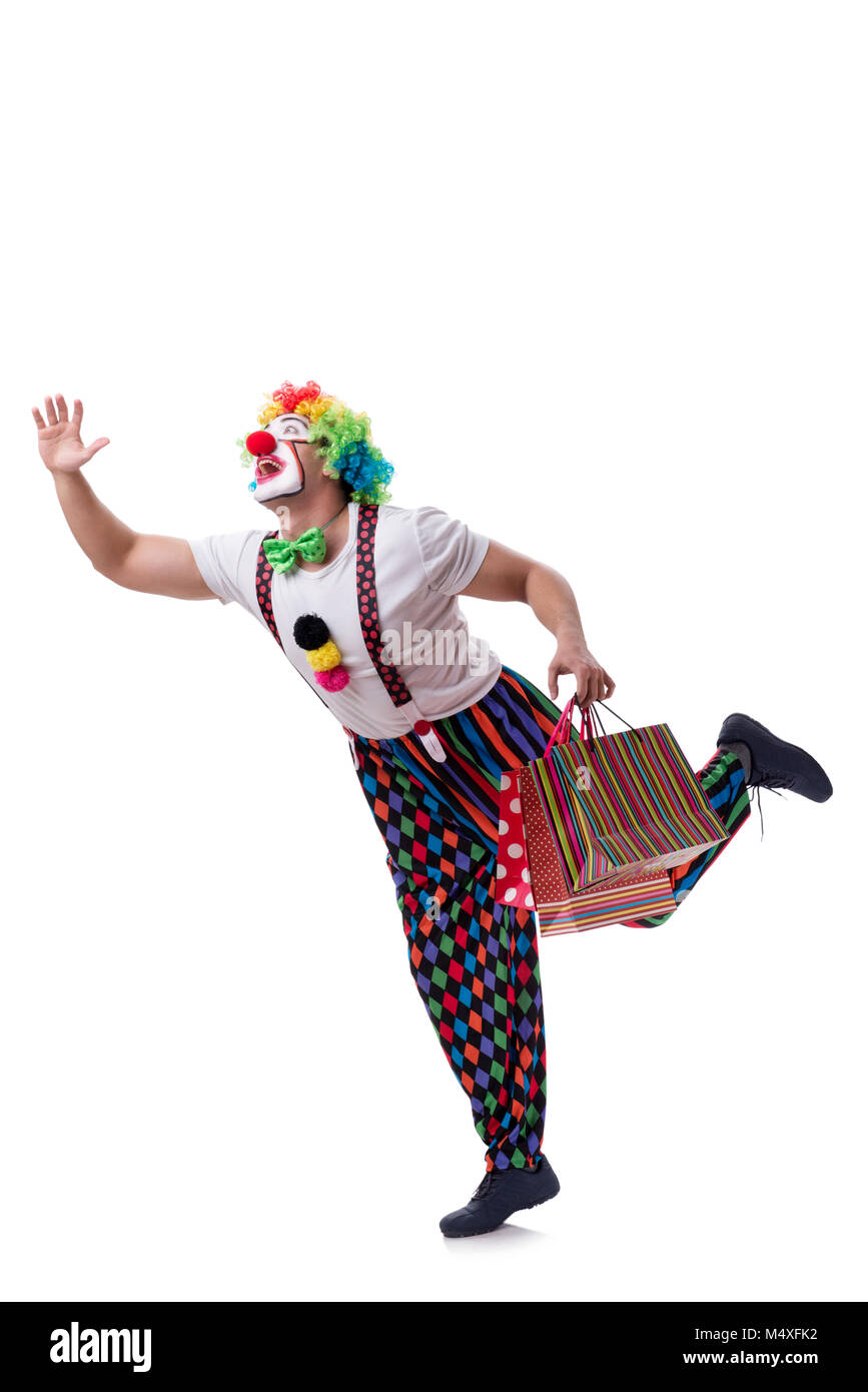 Funny clown with shopping bags isolated on white background Stock Photo ...