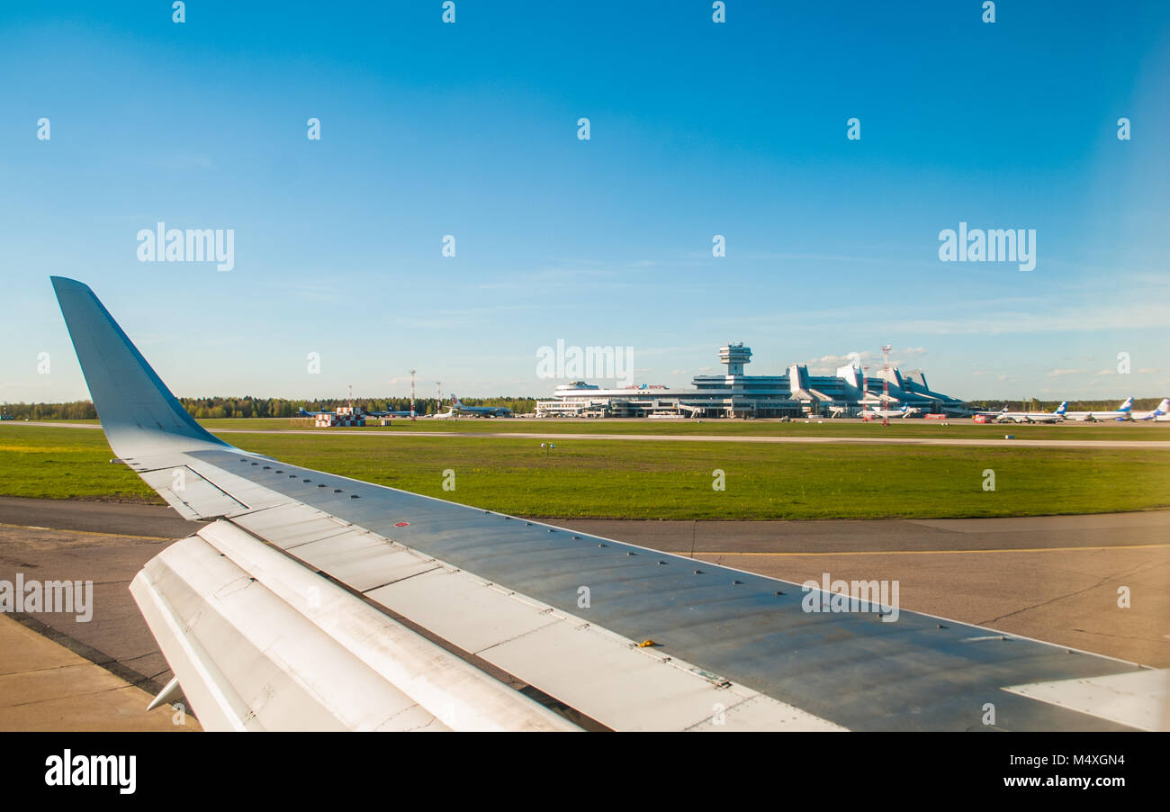Airport view from an airplane window. successful landing, the control ...