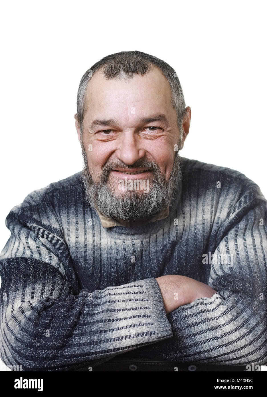 Real man with a beard looks at the camera on white background, smiles ...