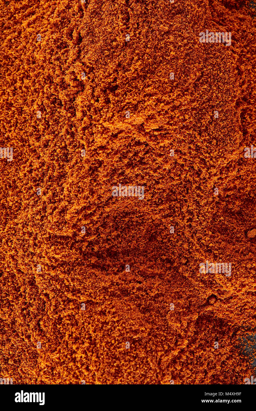 Top view on the texture background of red chilli pepper powder Stock ...