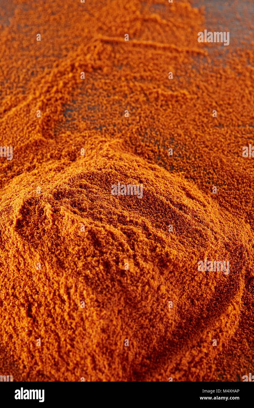 Top view on the texture background of red chilli pepper powder Stock ...
