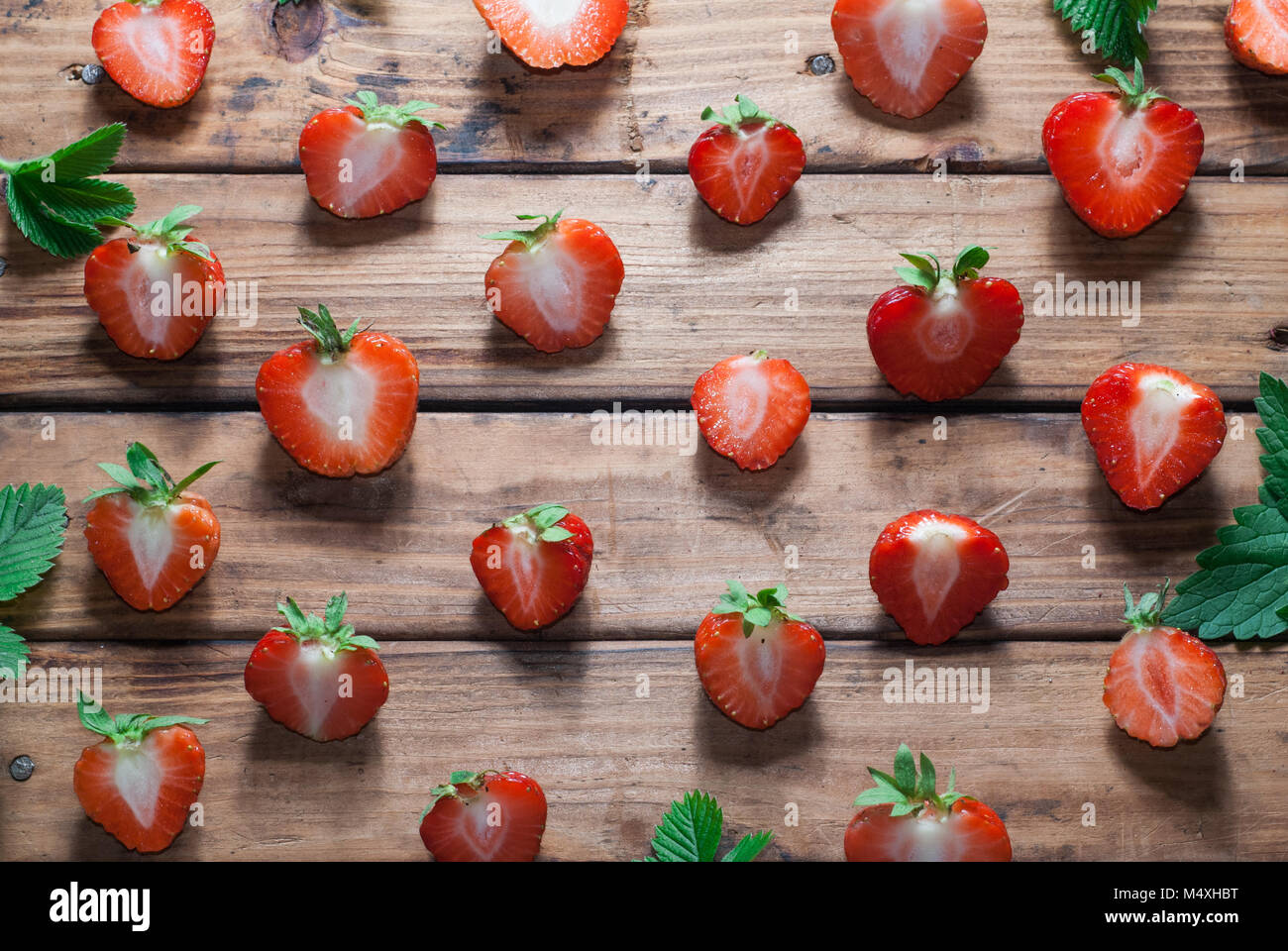strawberry template on wooden background, rustic style, red berry and ...