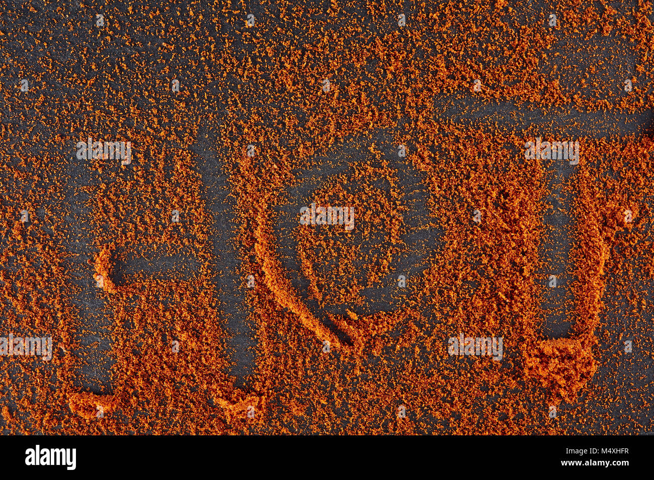 Top view on the texture background of red chilli pepper powder Stock ...