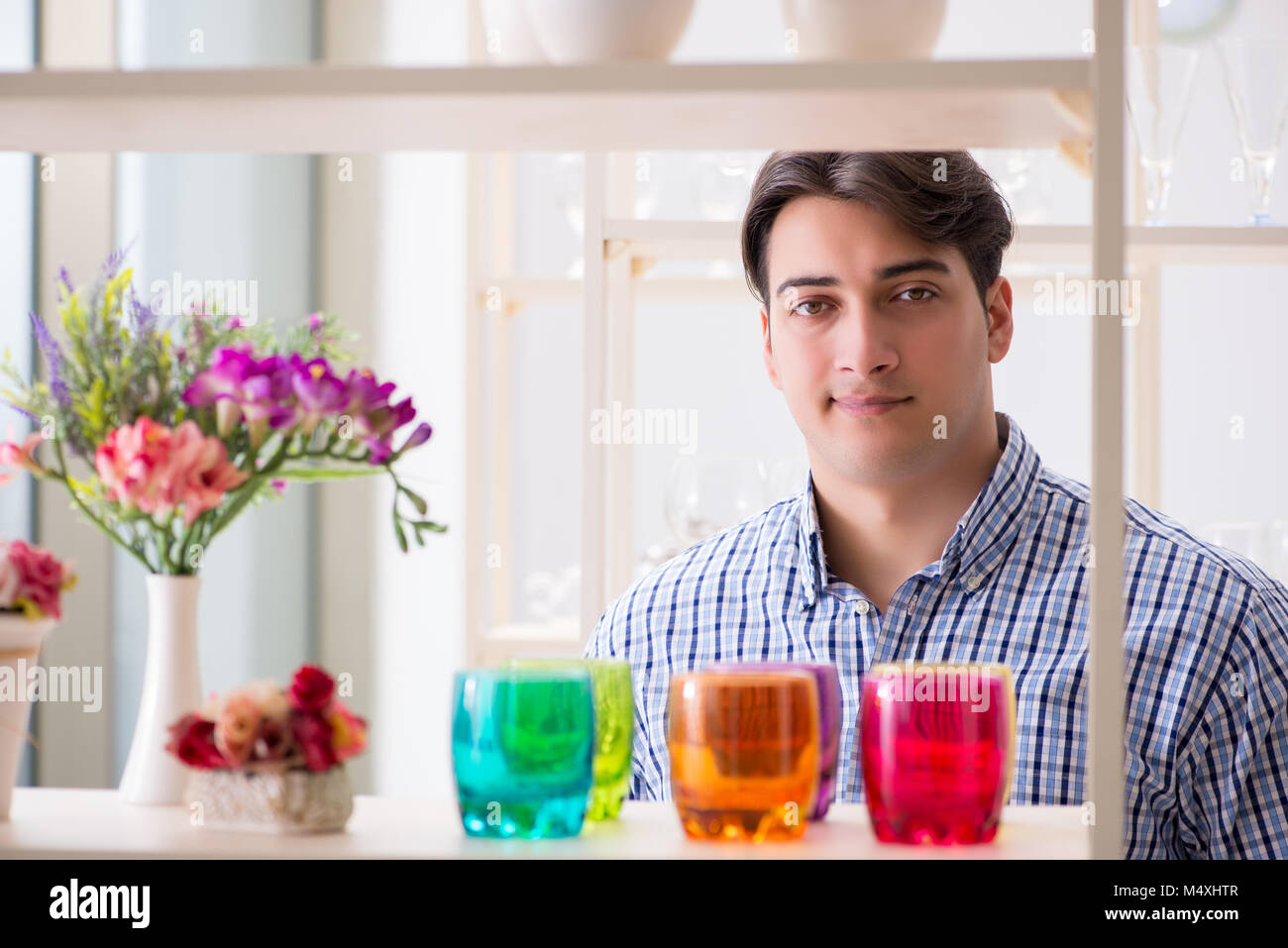 Young handsome man shopping in shop Stock Photo - Alamy