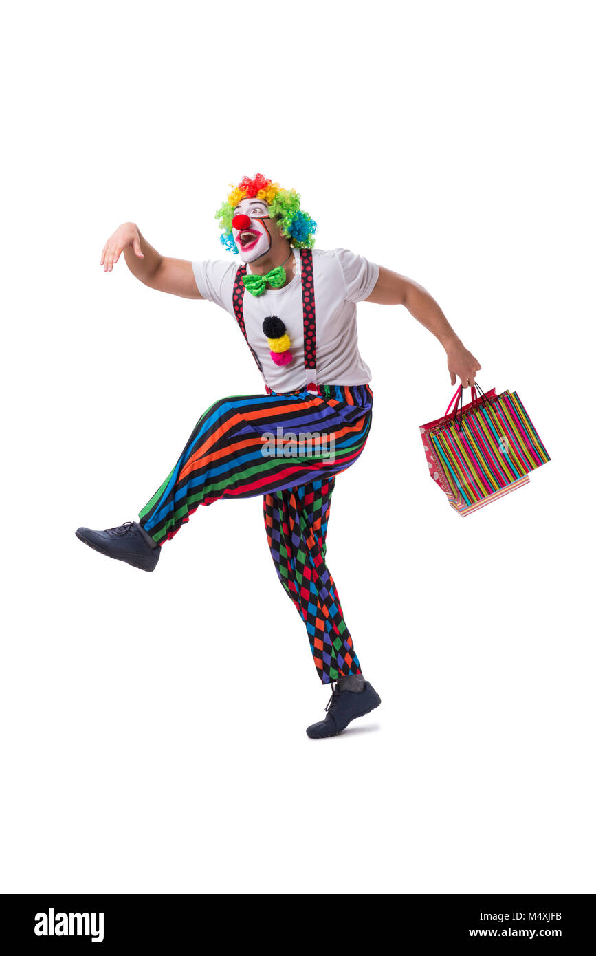 Funny clown with shopping bags isolated on white background Stock Photo ...
