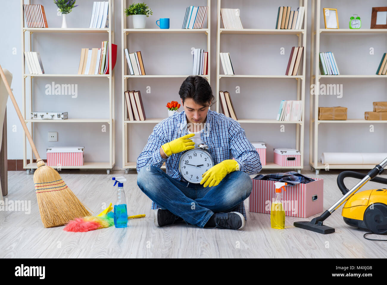 Man doing cleaning at home Stock Photo - Alamy