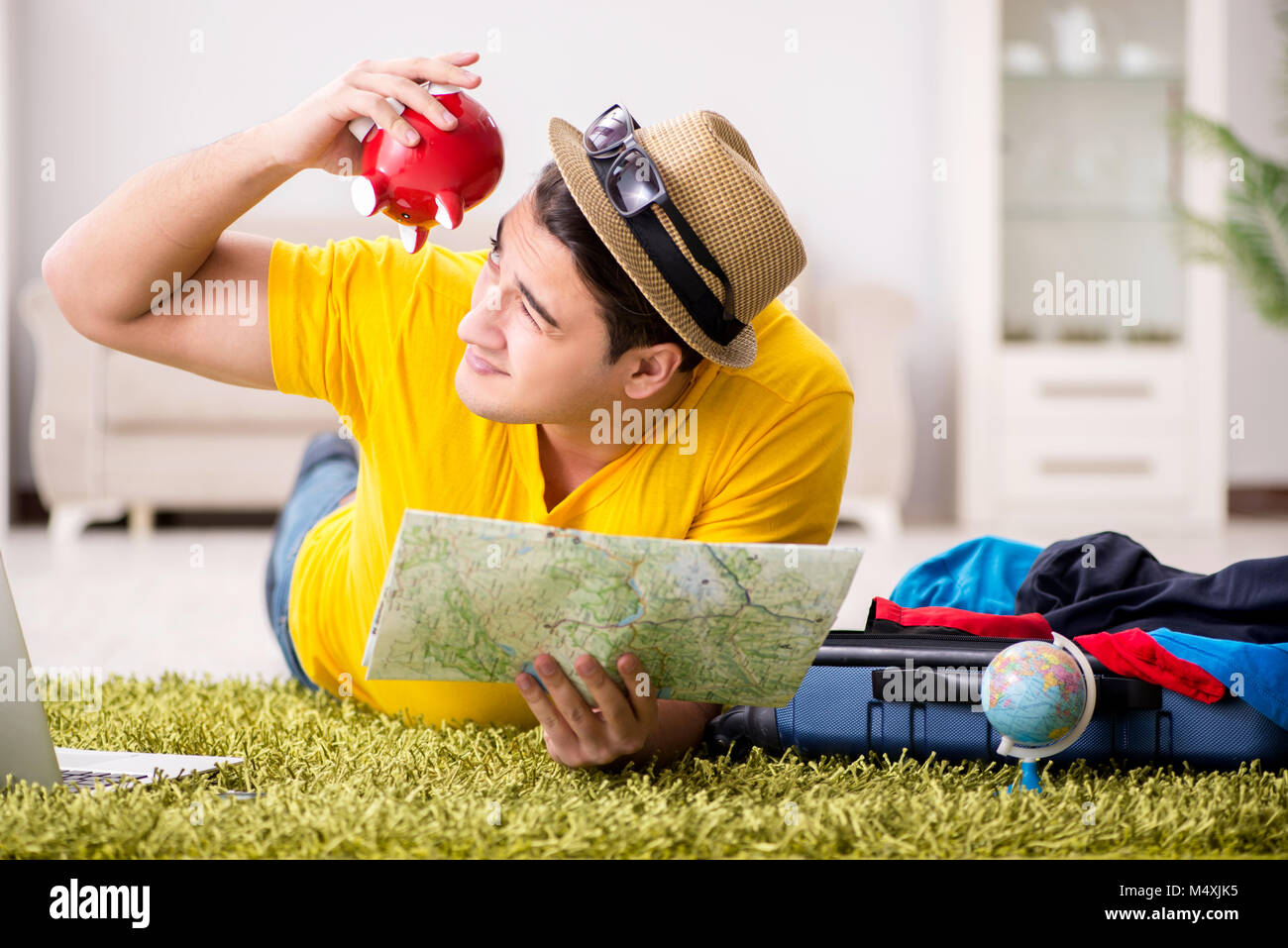 Man planning his vacation trip with map Stock Photo - Alamy