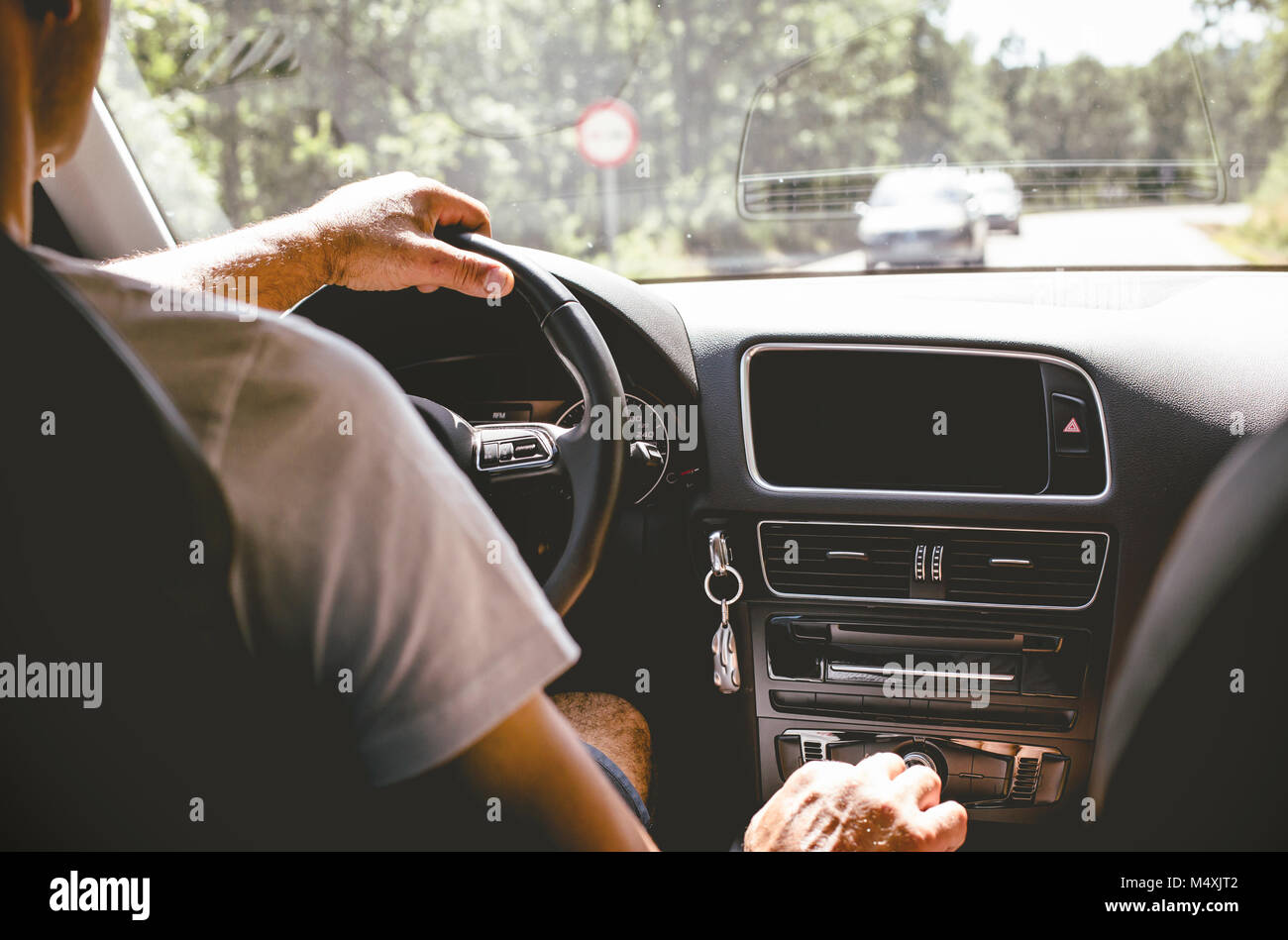 Man driving car from rear view on the highway Stock Photo - Alamy