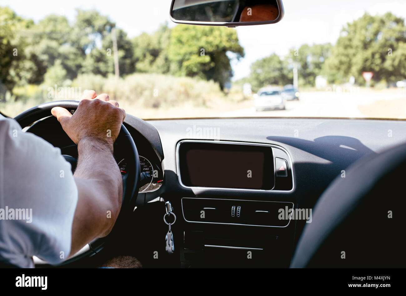 Man driving car from rear view on the highway Stock Photo - Alamy