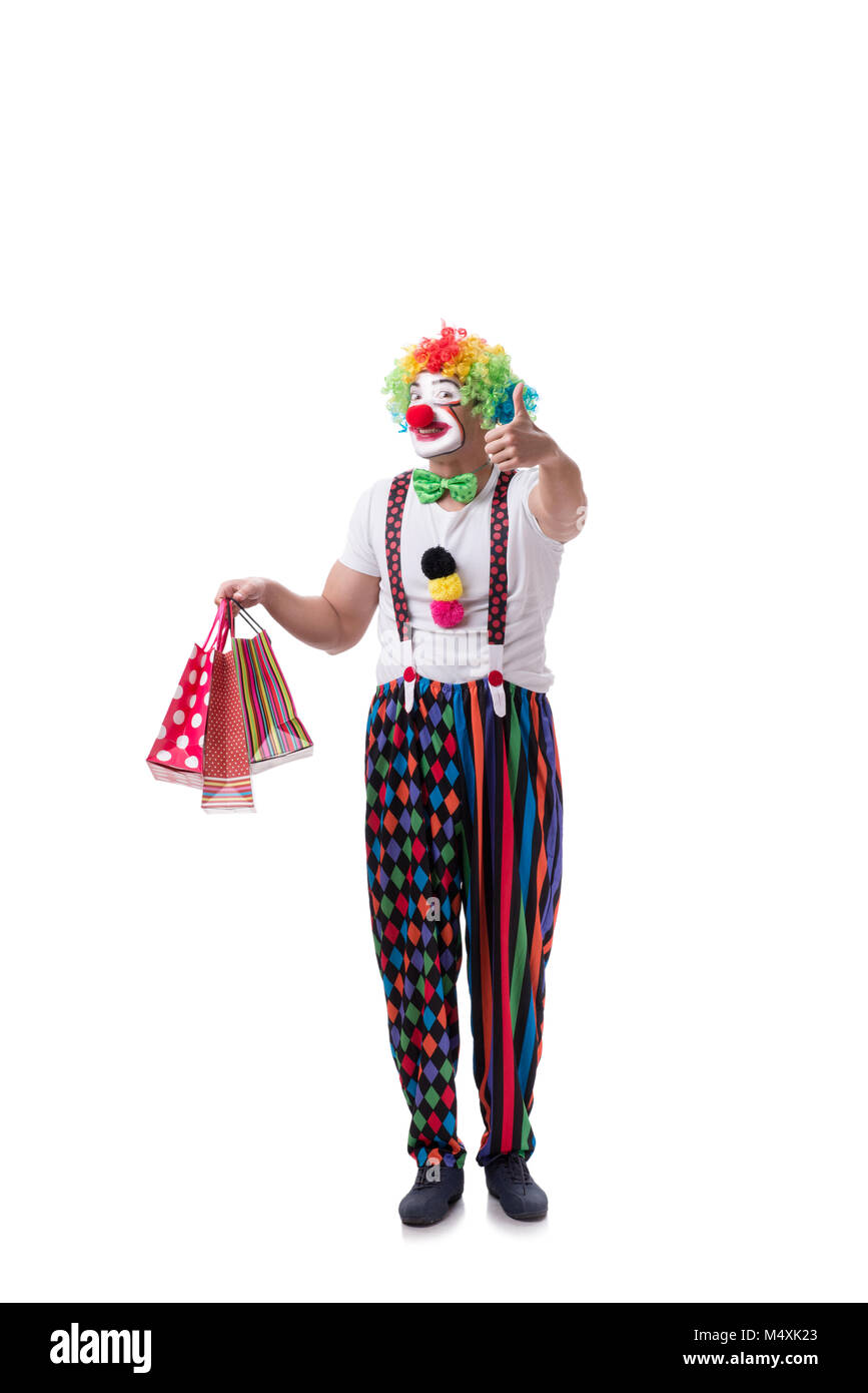 Funny clown with shopping bags isolated on white background Stock Photo ...