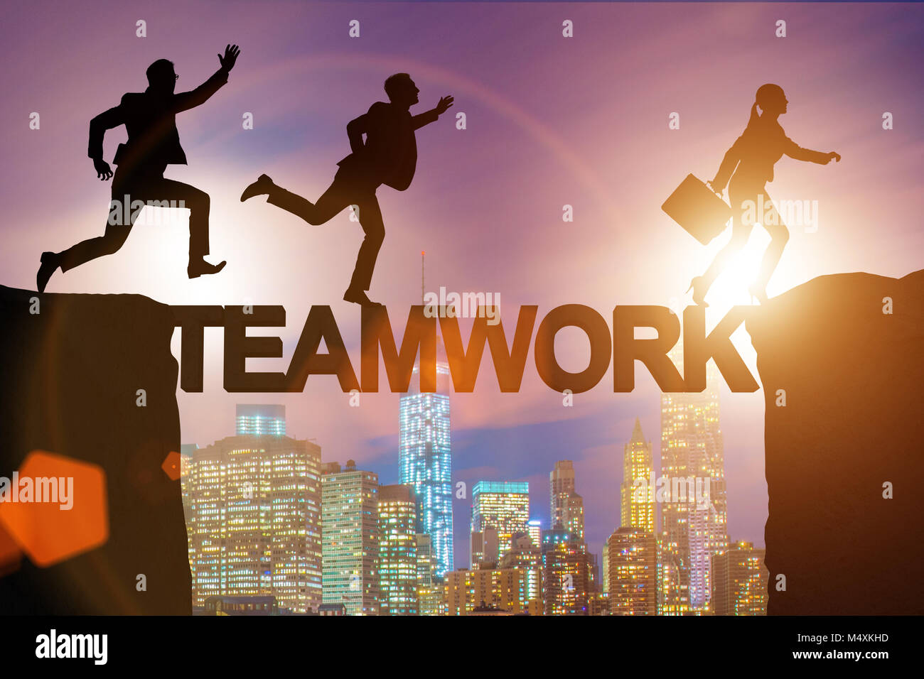 Teamwork concept with business people crossing bridge Stock Photo - Alamy
