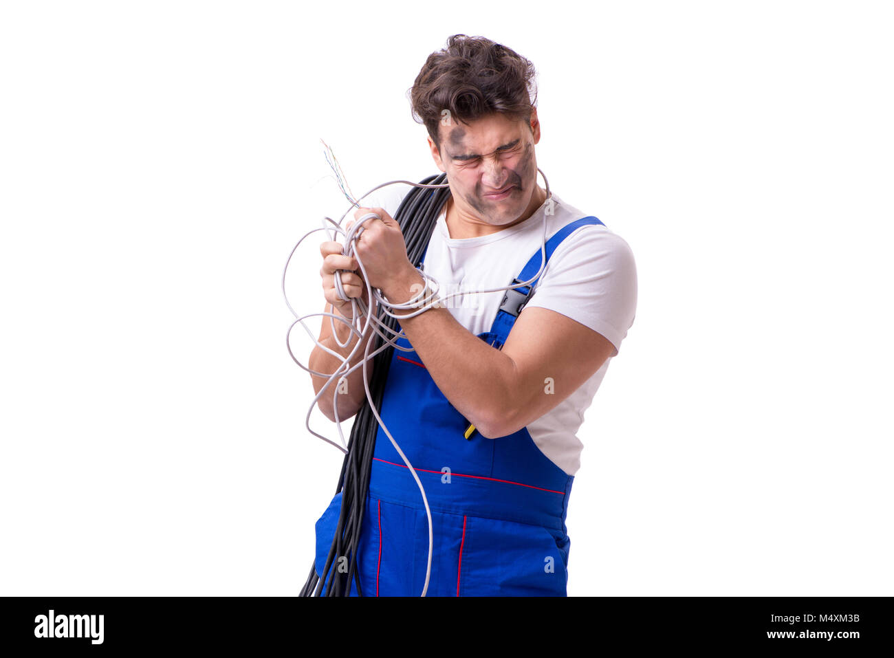 Funny man doing electrical repair Stock Photo - Alamy