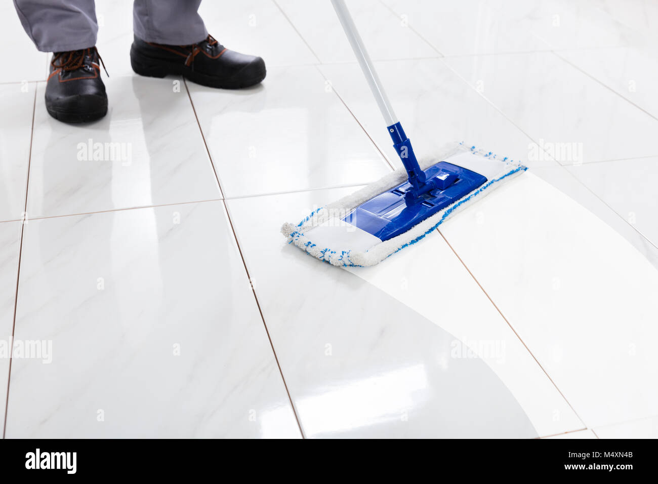Mopping floor hi-res stock photography and images - Alamy