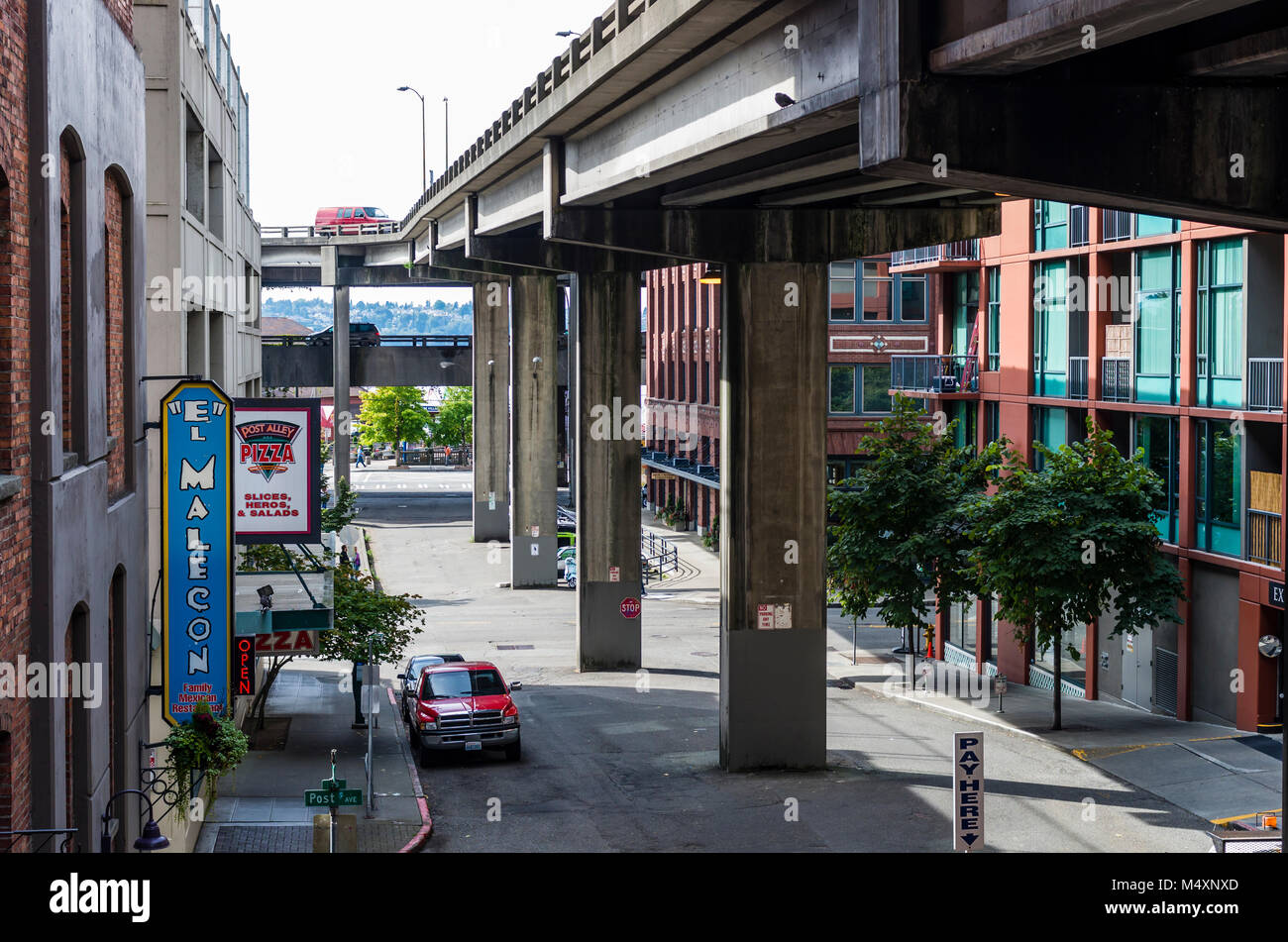 Street scene of Seattle with restaurants and apartment buildings ...
