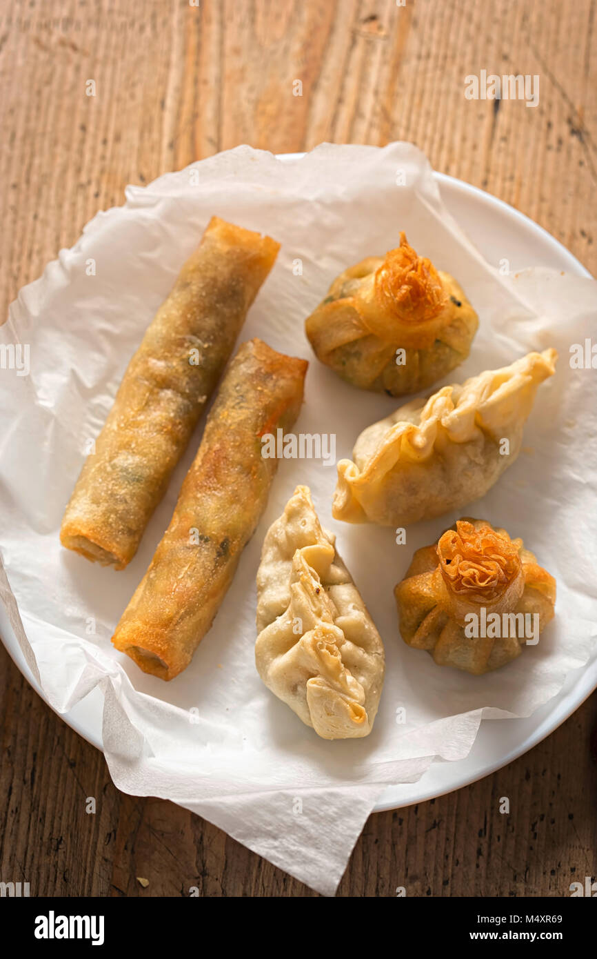 Prawn wonton, vegetable spring rolls and vegetable money bags Stock ...