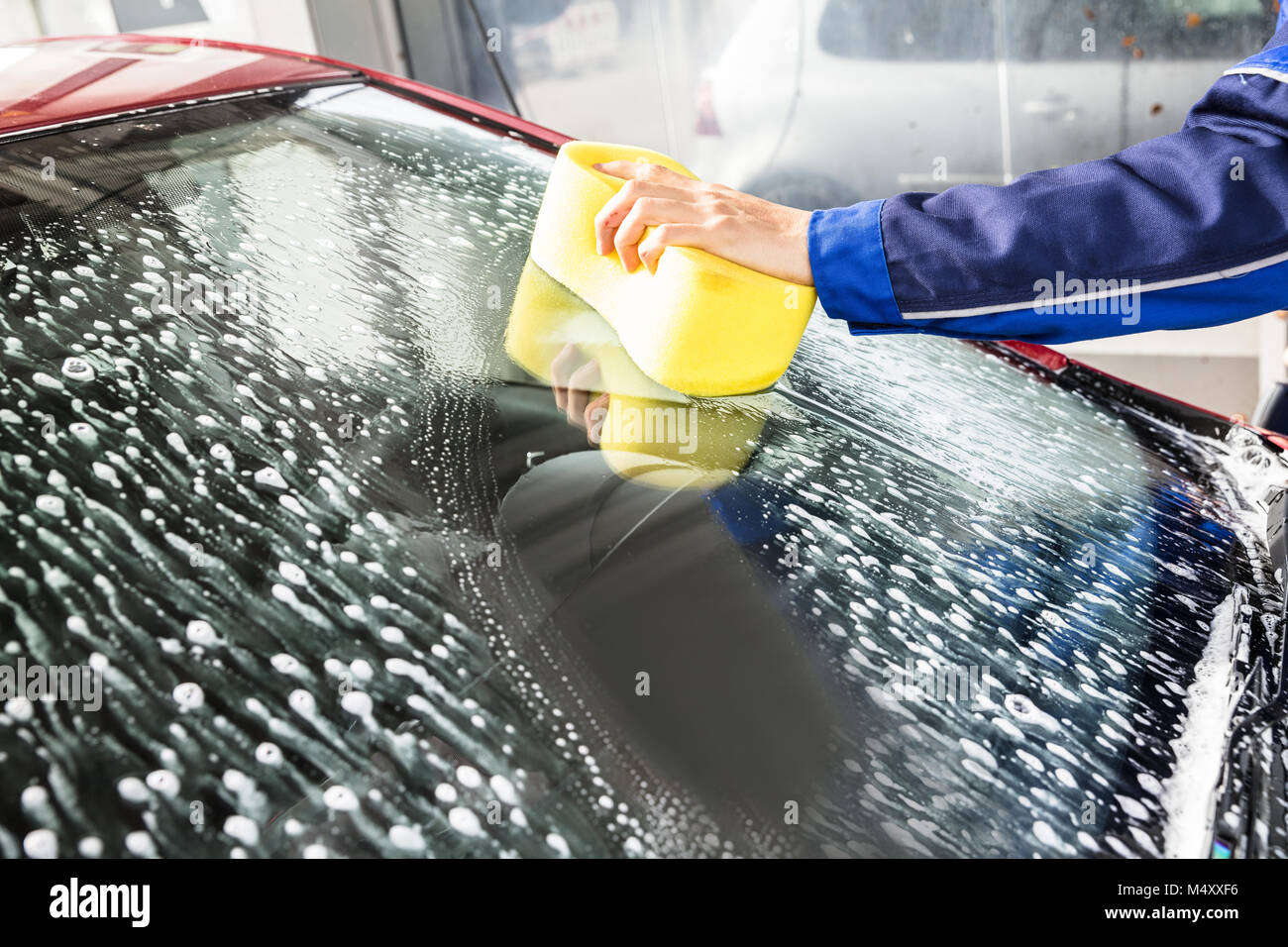 Cleaning windshield hi-res stock photography and images - Alamy