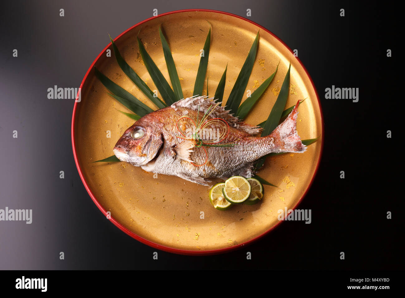 Broiled sea bream with salt Stock Photo - Alamy