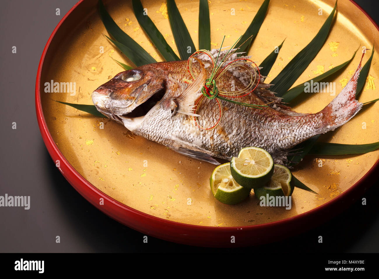 Broiled sea bream with salt Stock Photo - Alamy