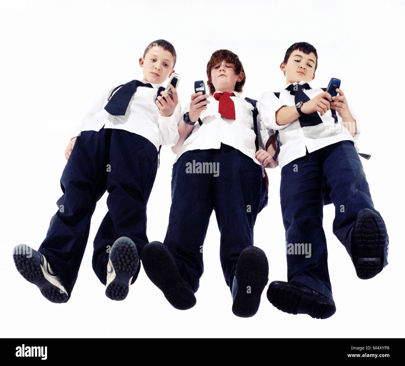 Three secondary schoolboys Stock Photo - Alamy