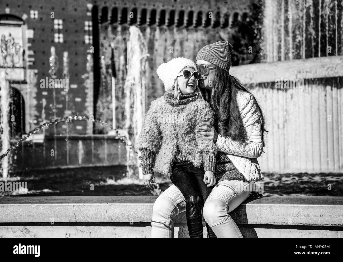Rediscovering things everybody love in Milan. smiling modern mother and ...