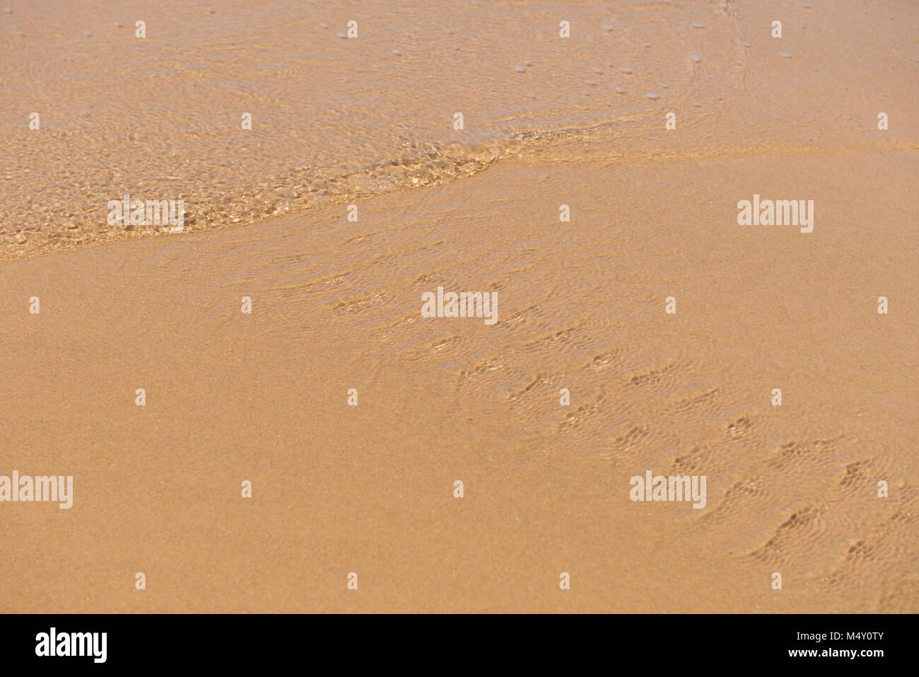 Water forms and effects all over the beach Stock Photo - Alamy